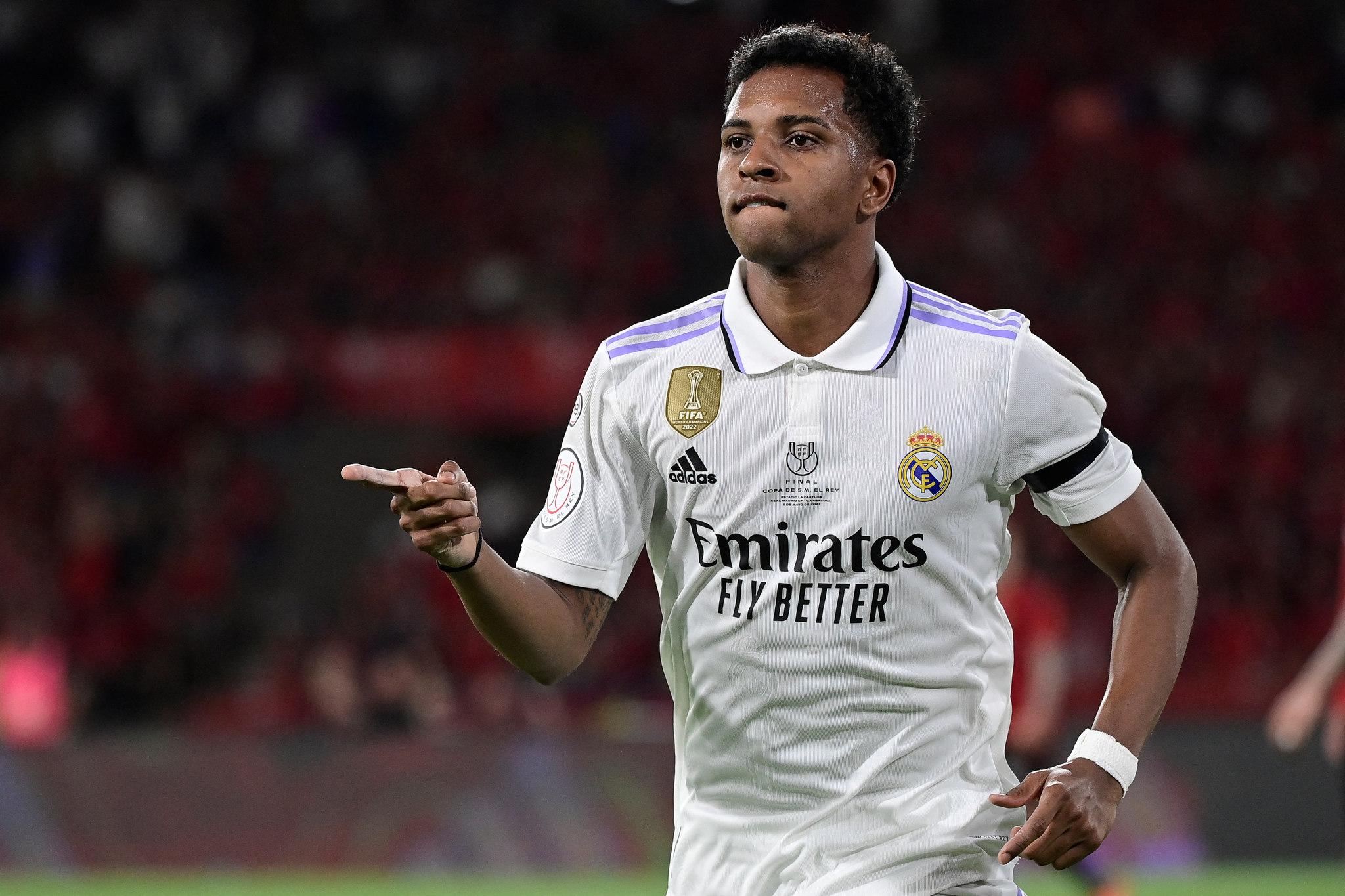 Com gol de Rodrygo, Real Madrid vence Atlético e larga na frente nas ...